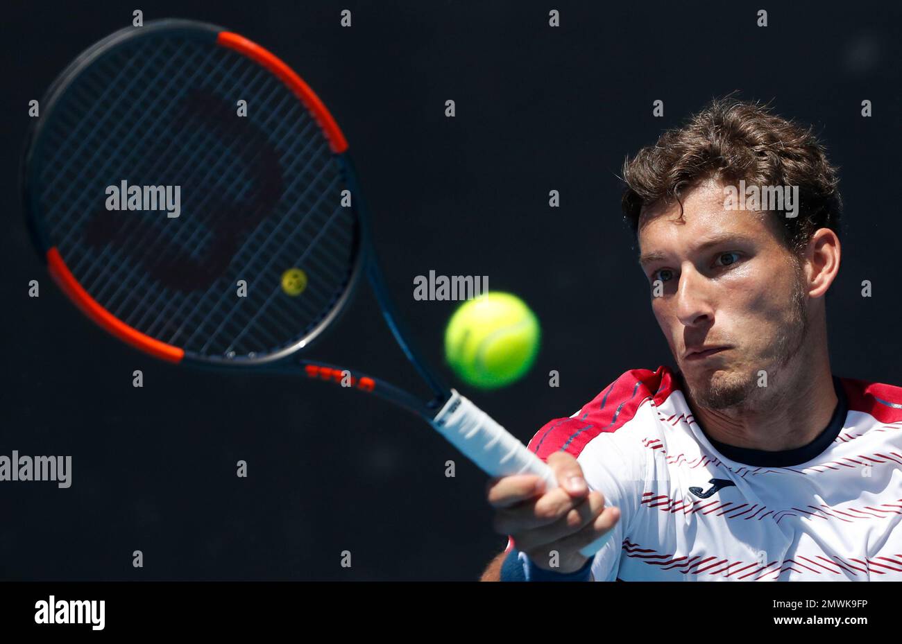Spain's Pablo Carreno Busta makes a forehand return to Britain's Kyle ...