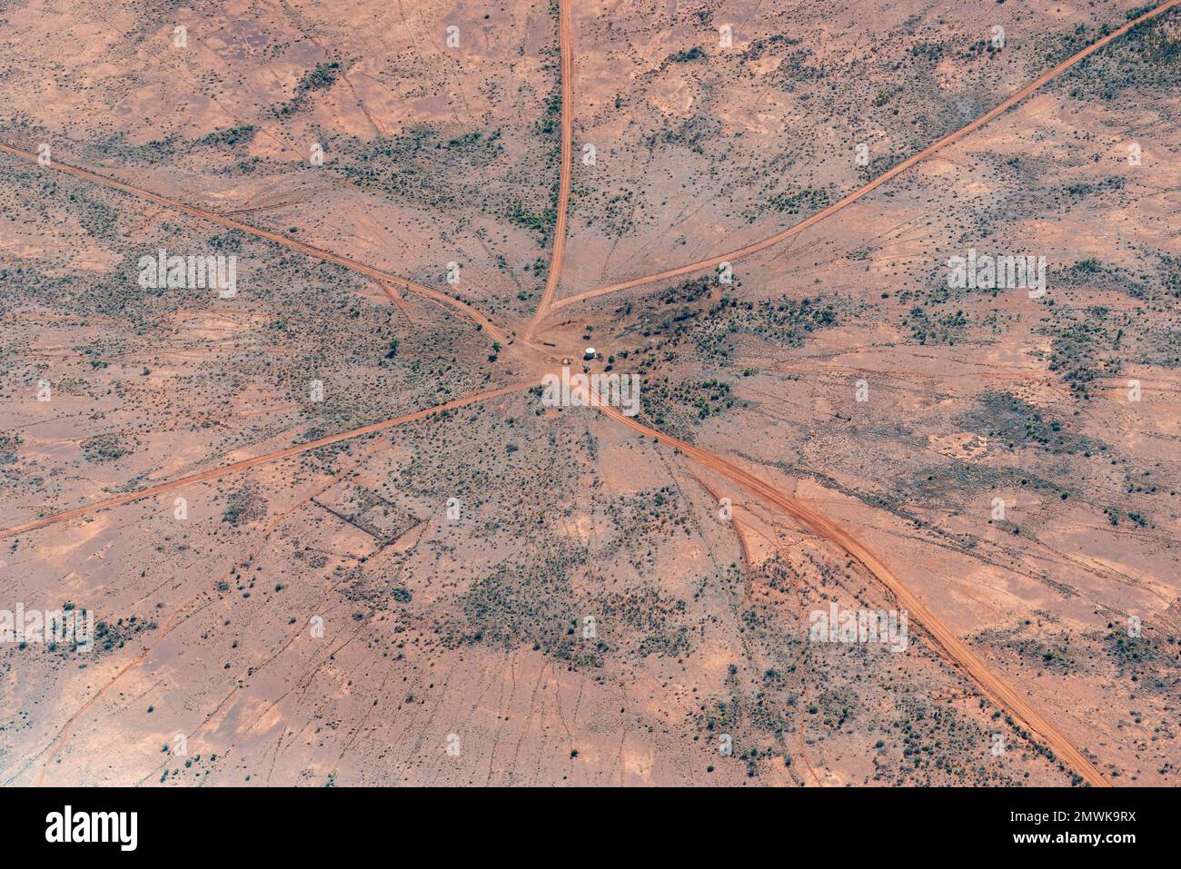 An aerial shot of a water tank and roads in outback South Australia ...