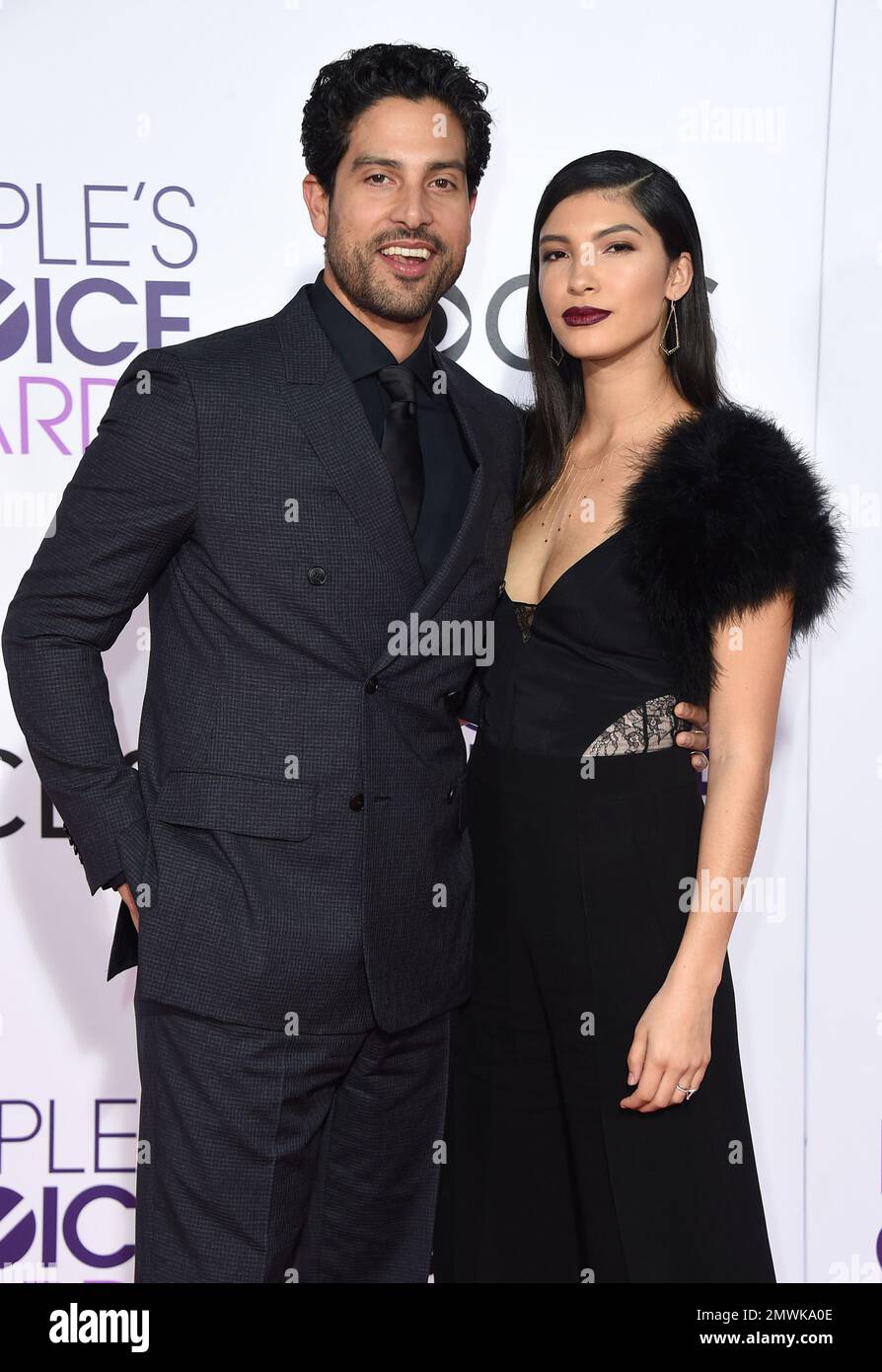 Adam Rodriguez, left, and Grace Gail arrive at the People's Choice ...