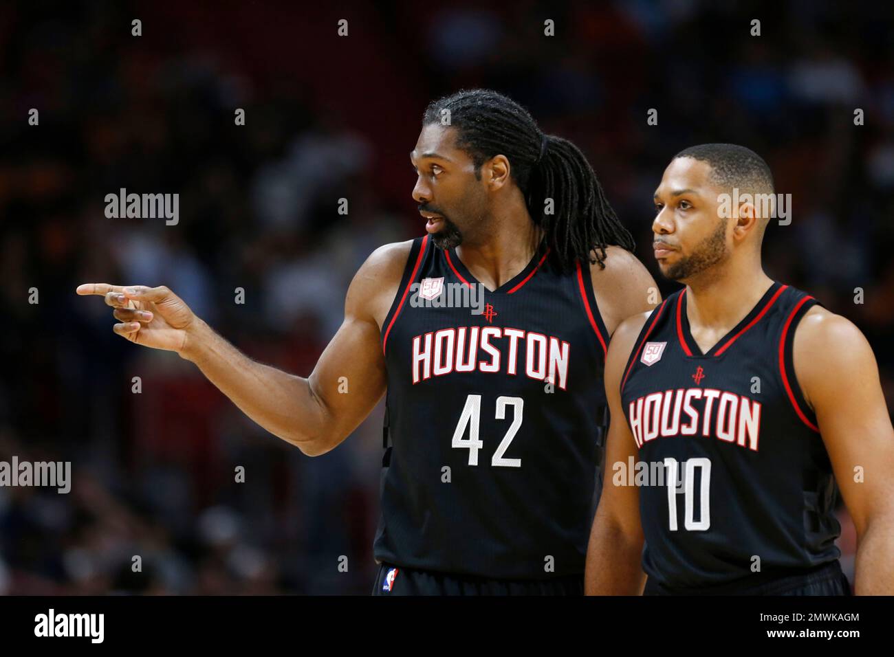 Houston Rockets center Nene Hilario (42) and guard Eric Gordon (10 ...