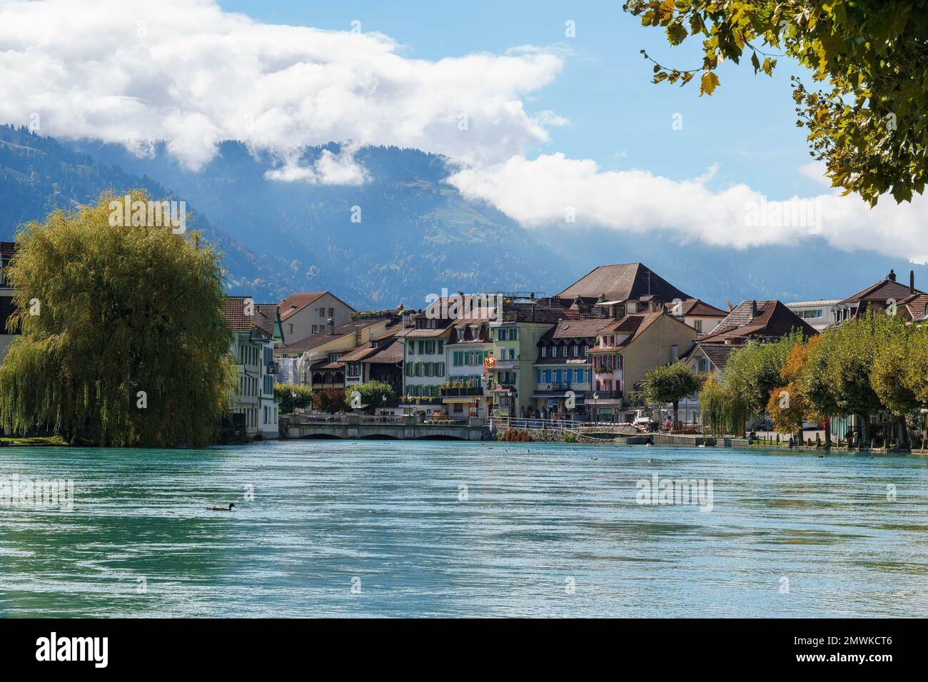 The town of Interlaken, Switzerland viewed from the river, with ...