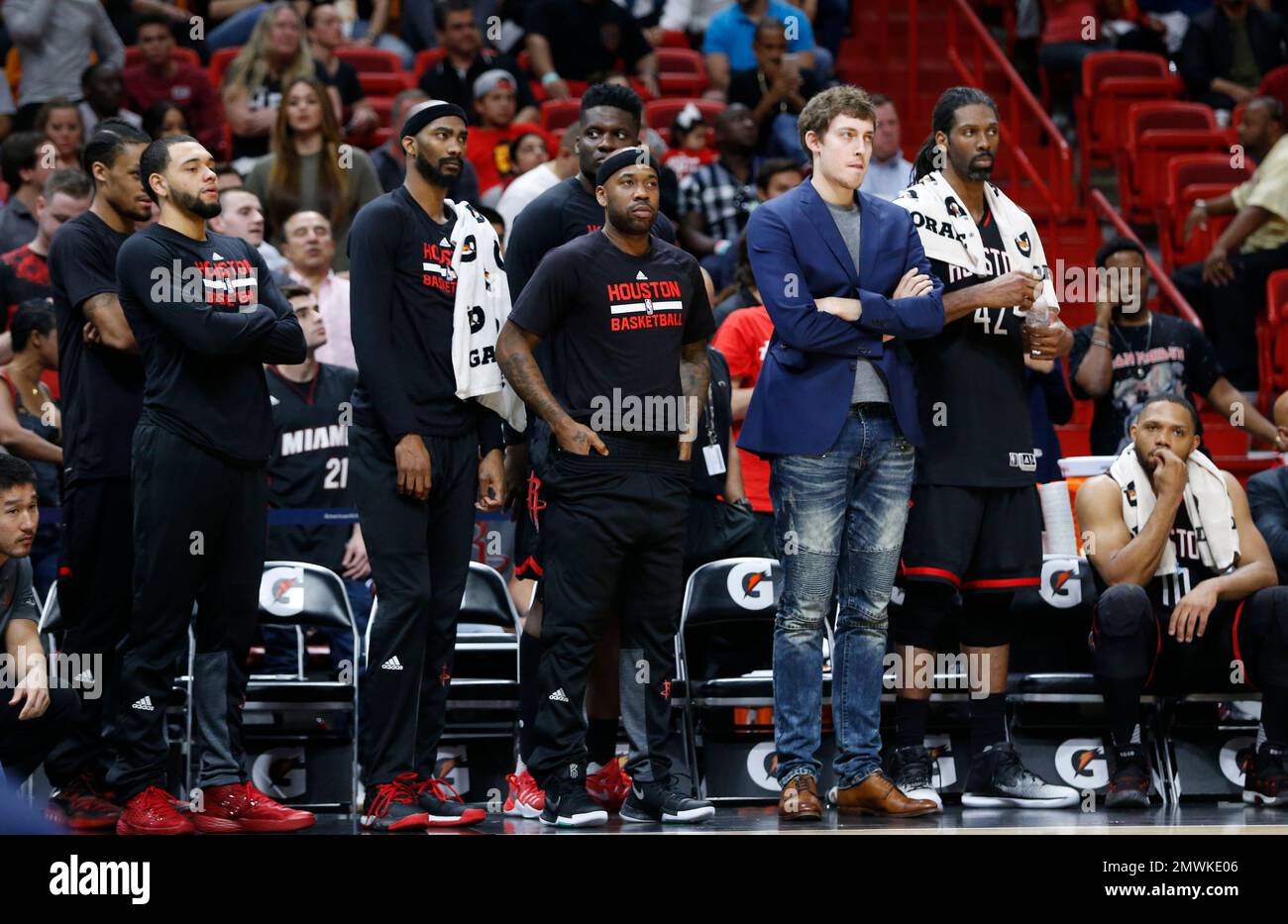 Houston Rockets players stand off the bench during the final minutes of ...