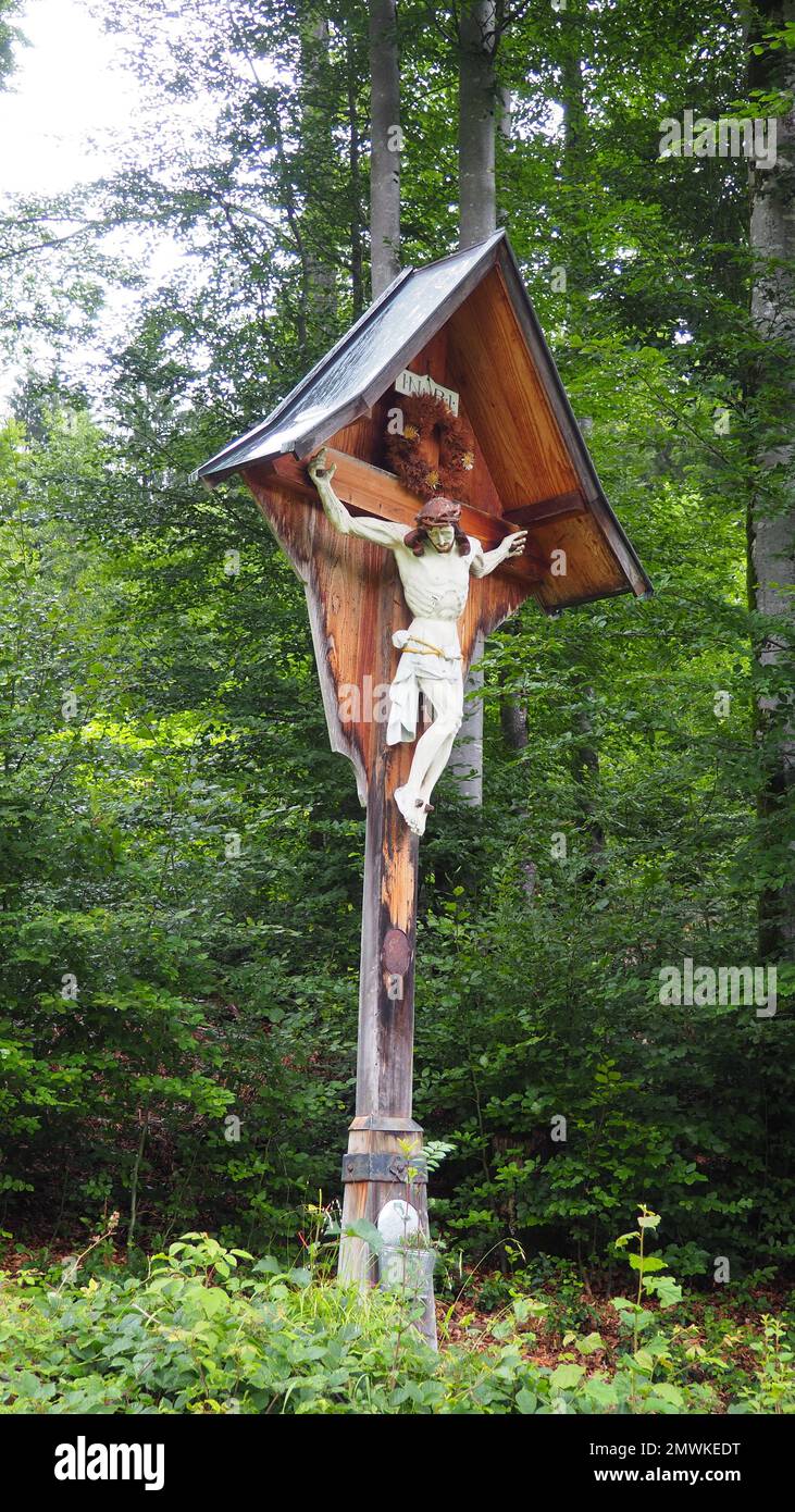 A vertical shot of a monument of Jesus Christ in a park Stock Photo - Alamy