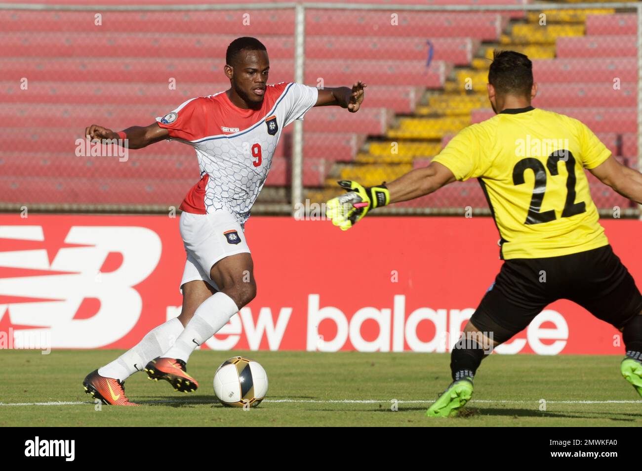 Belize's Deon Mccaulay, left, approaches El Salvador's goalkeeper Benji ...