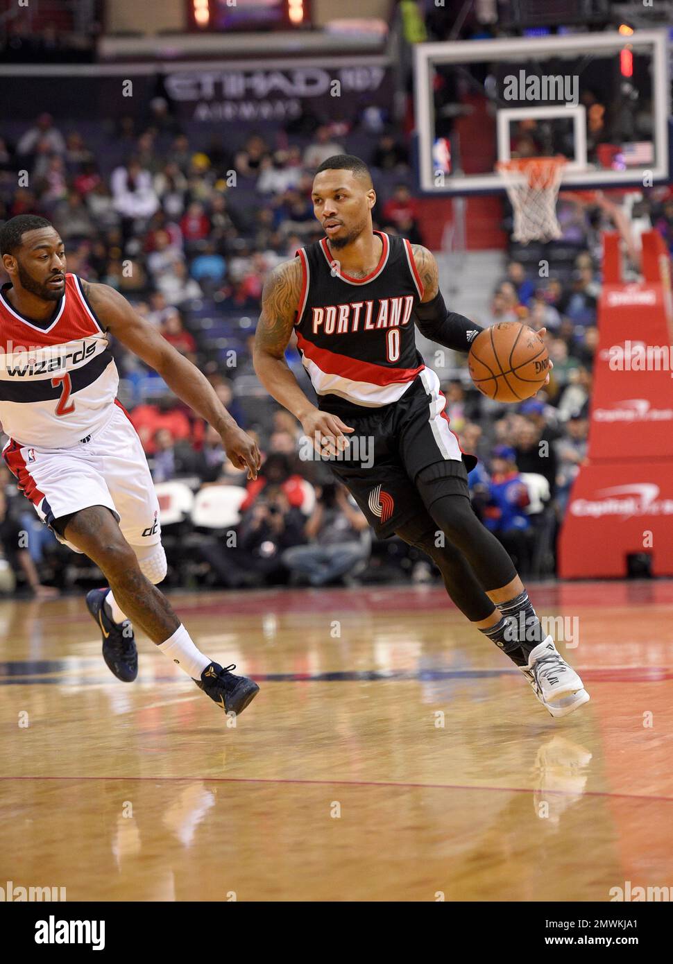 Portland Trail Blazers guard Damian Lillard (0) dribbles past ...