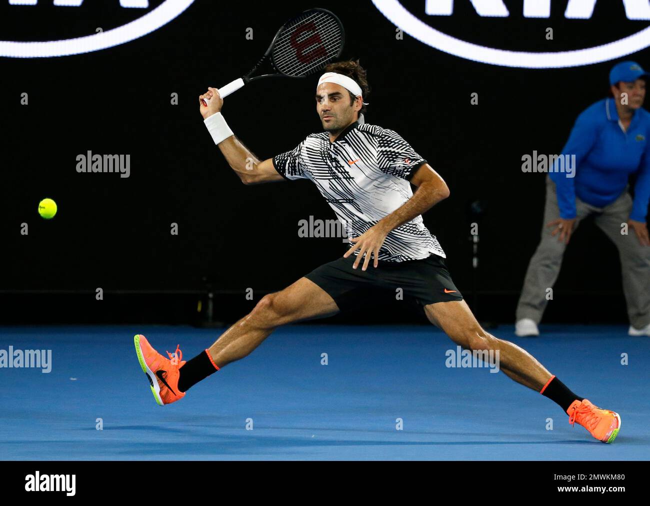 Switzerland's Roger Federer makes a forehand return to Austria's Jurgen ...