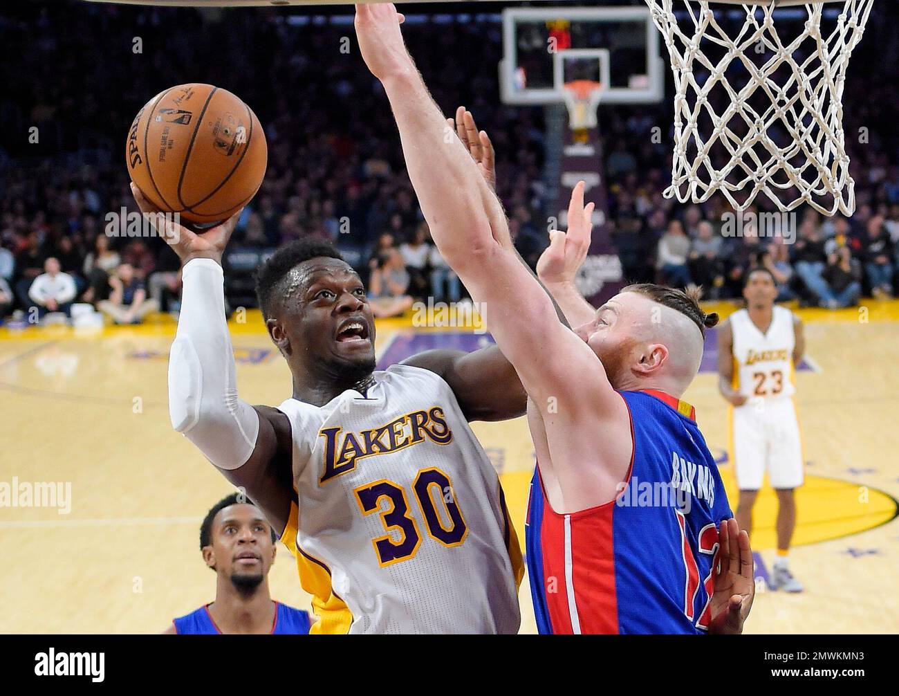 Los Angeles Lakers forward Julius Randle, left, shoots as Detroit ...