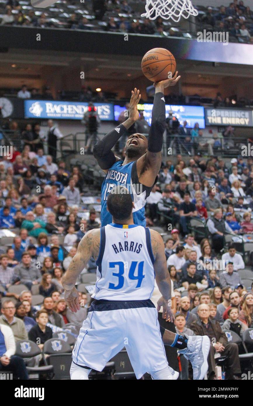 Minnesota Timberwolves forward Shabazz Muhammad (15) shoots over Dallas ...