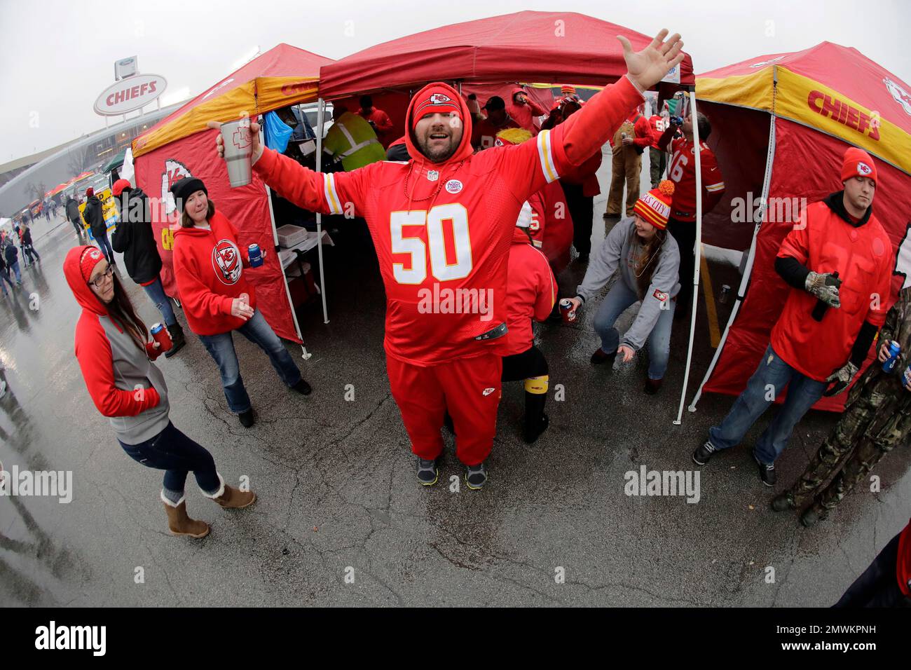 Fans tailgate outside Arrowhead Stadium before an NFL divisional ...