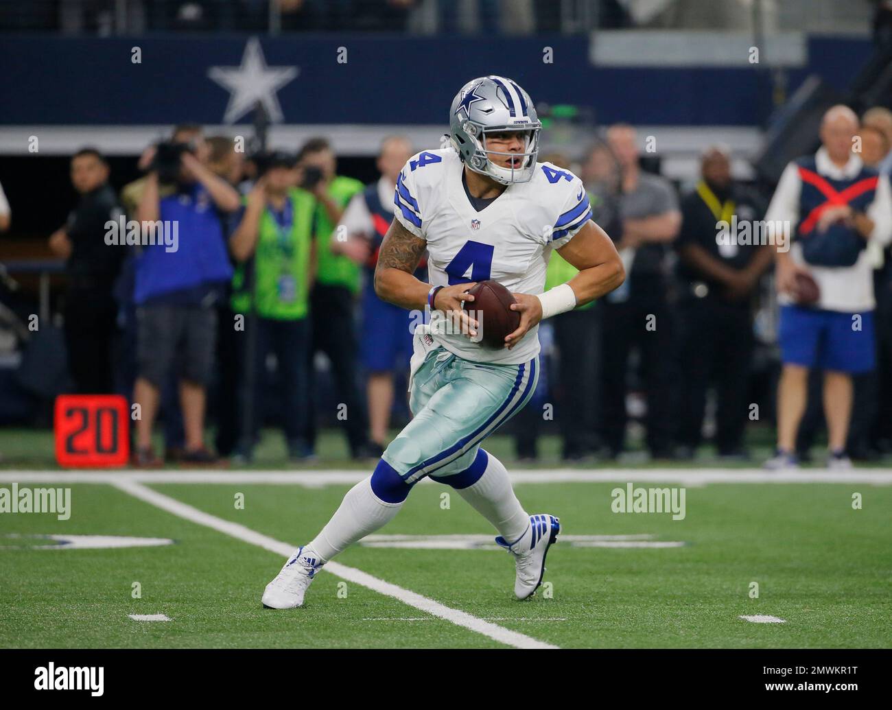 Dallas Cowboys' Dak Prescott drops back during the first half of an NFL ...
