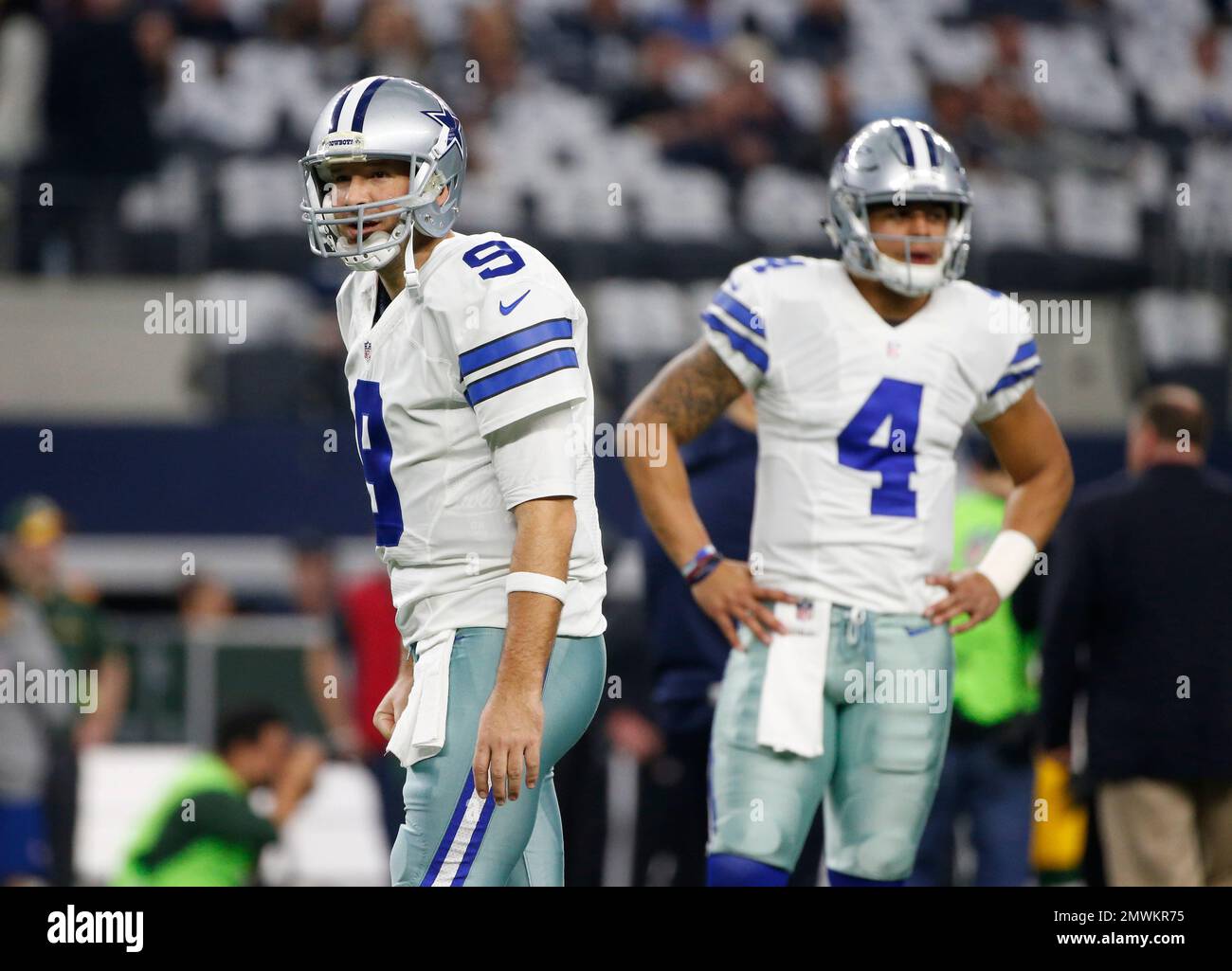 Dallas Cowboys' Tony Romo talks to Dak Prescott before an NFL ...