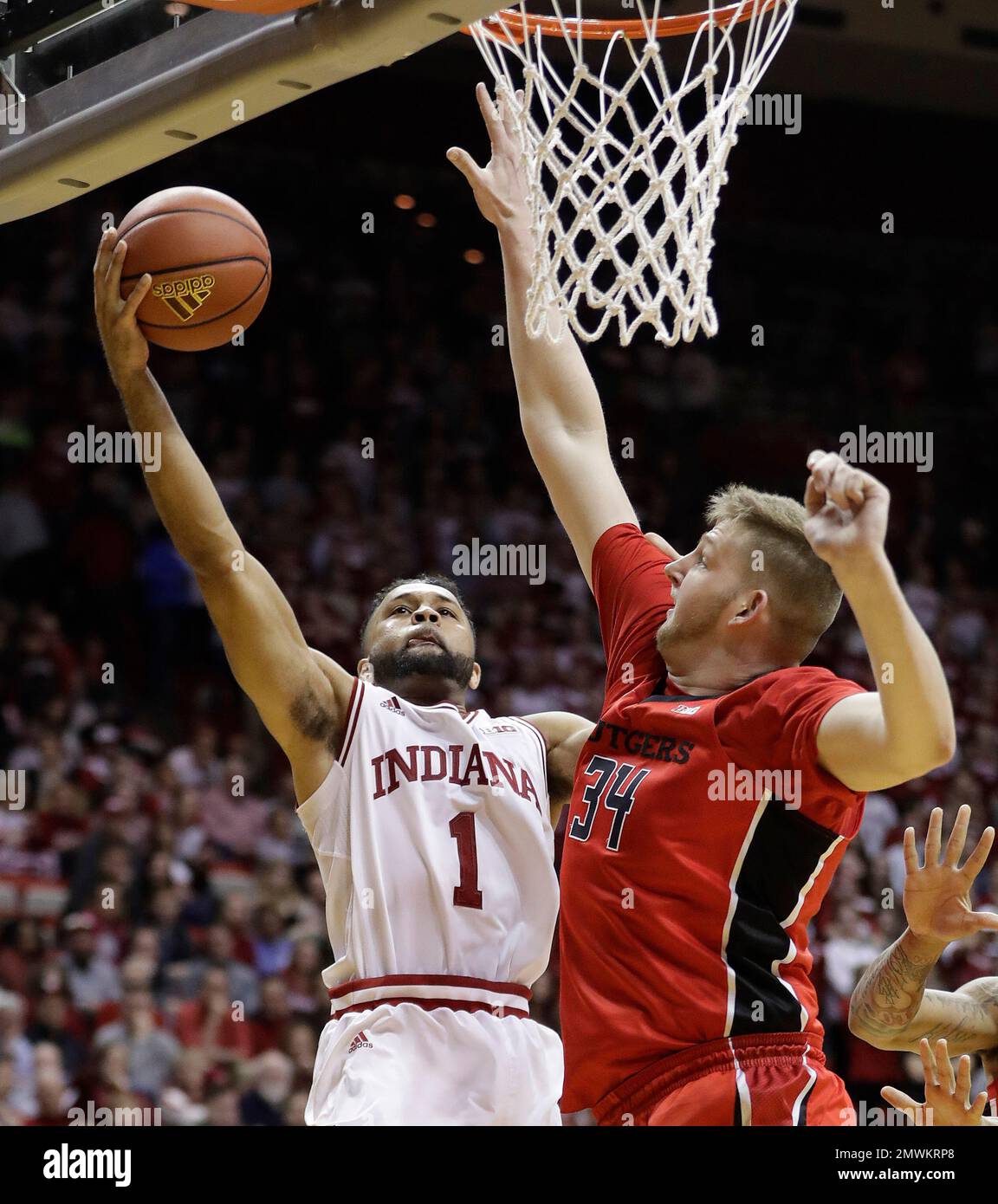 Indiana's James Blackmon Jr.shoots against Rutgers' C.J. Gettys during ...