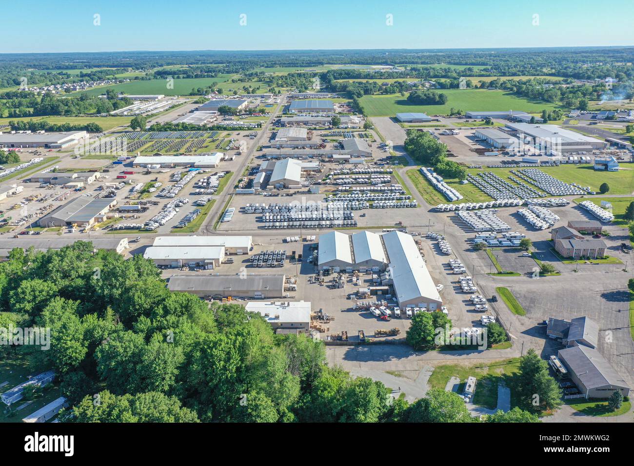 An aerial view of a factory with trucks parked in the parking lot Stock ...