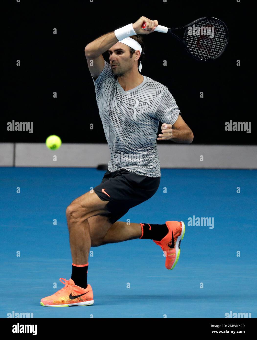 Switzerland's Roger Federer makes a forehand return during a practice ...