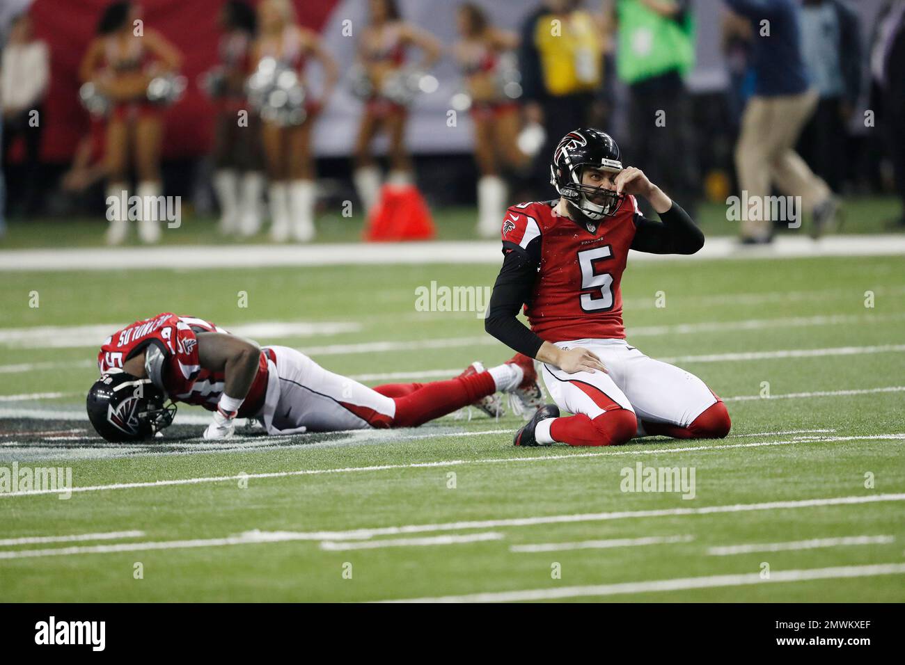 Atlanta Falcons punter Matt Bosher (5) sits on the field after an ...