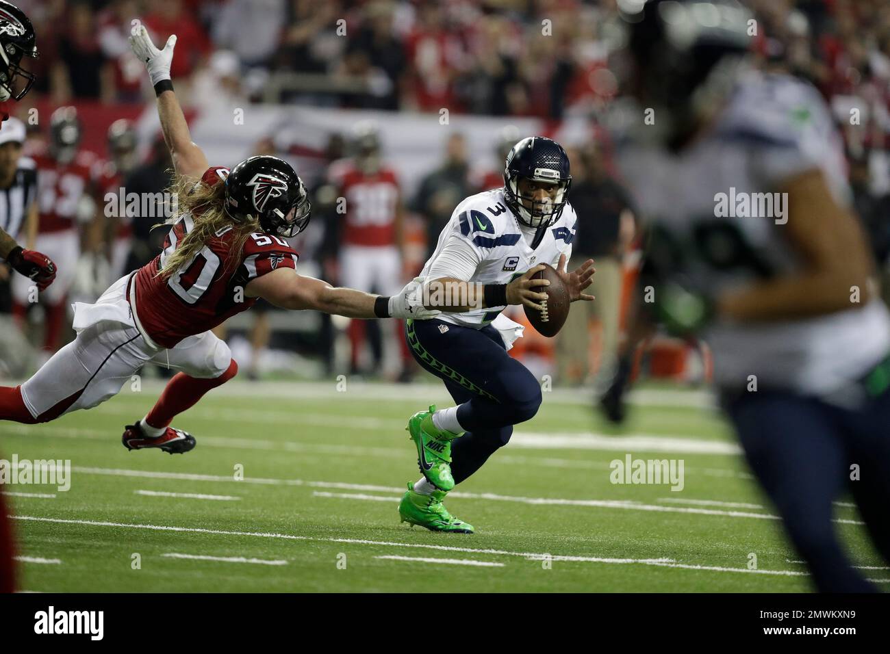 Atlanta Falcons defensive end Brooks Reed (50)pursues Seattle Seahawks ...
