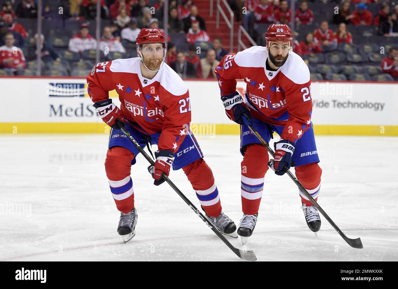 Washington Capitals defenseman Karl Alzner (27) stands next to left ...