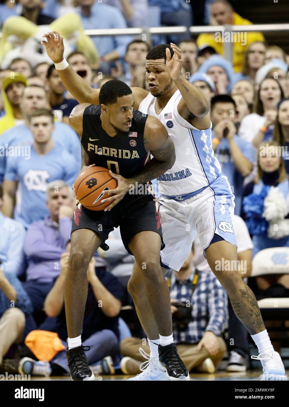 North Carolina's Kennedy Meeks guards Florida State's Phil Cofer (0 ...