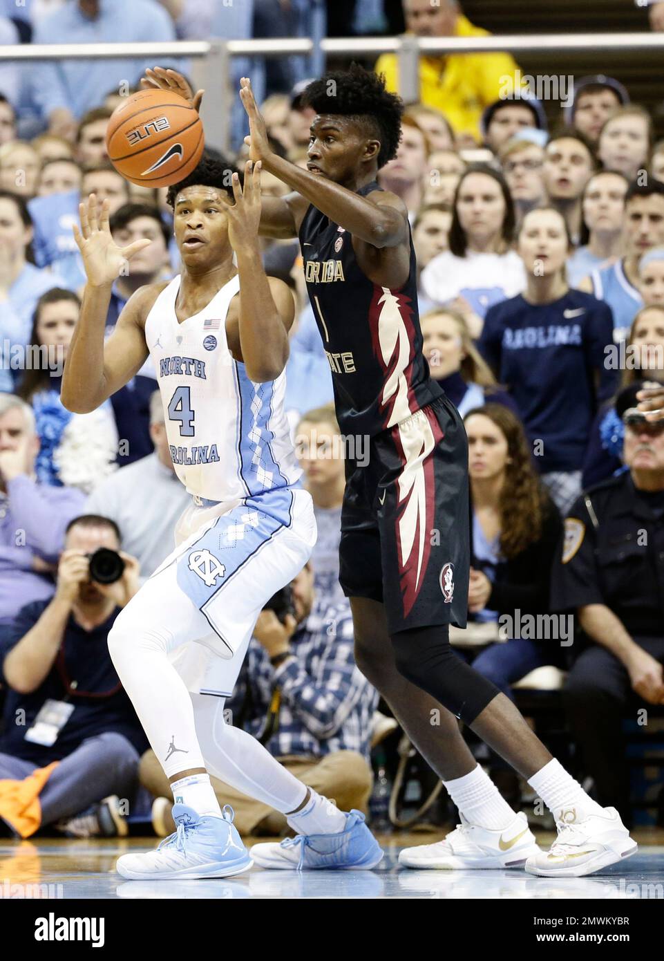 North Carolina's Isaiah Hicks (4) and Florida State's Jonathan Isaac ...