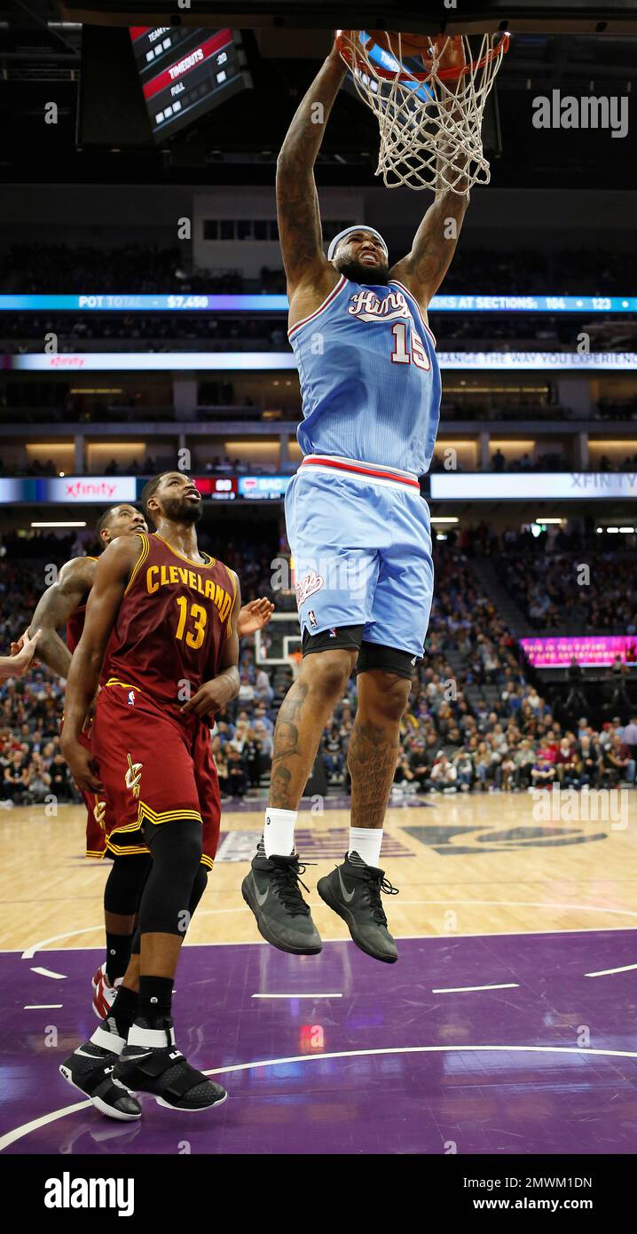 Sacramento Kings forward DeMarcus Cousins, right, stuffs as Cleveland ...