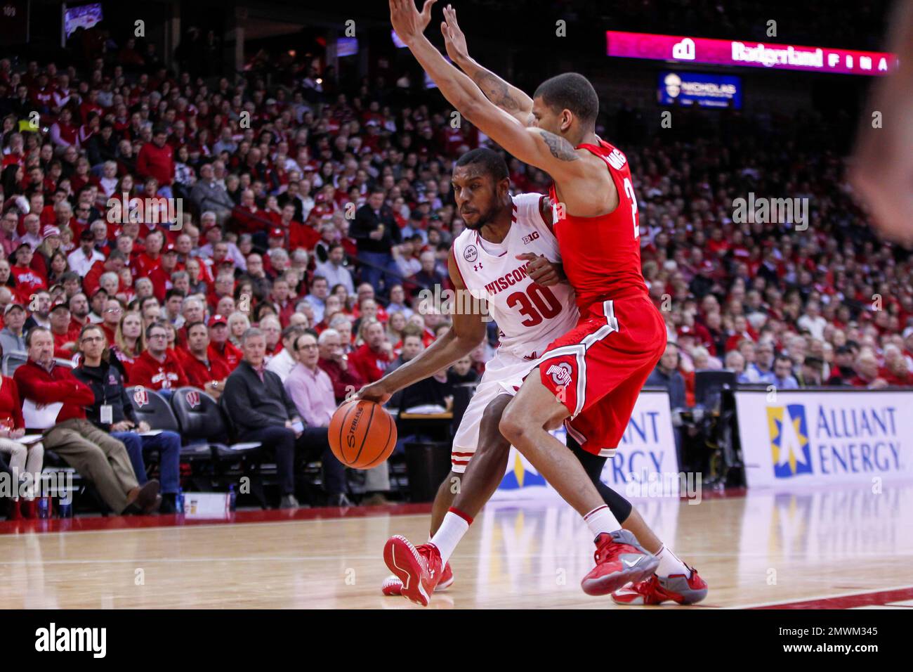 Wisconsin's Vitto Brown (30) and Ohio State's Marc Loving (2) during ...