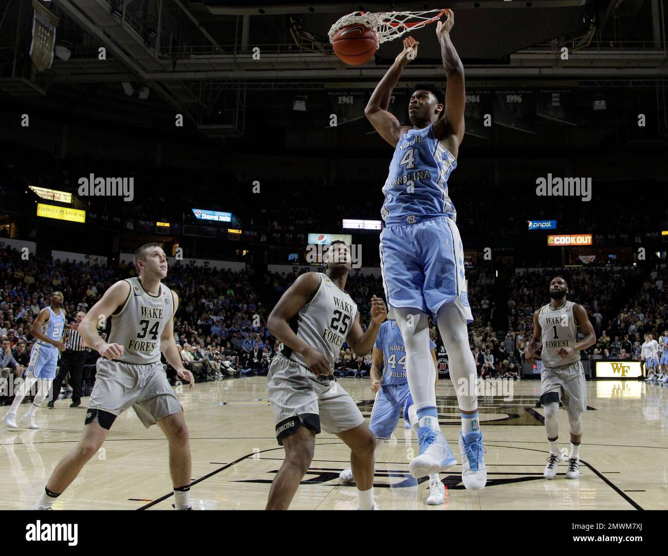 North Carolina's Isaiah Hicks (4) dunks against Wake Forest in the ...