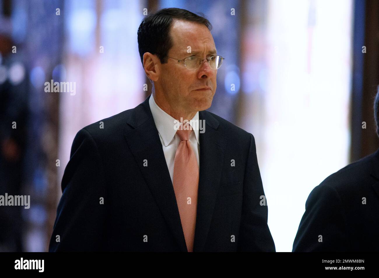 AT&T CEO Randall Stephenson arrives in the lobby of Trump Tower in New ...