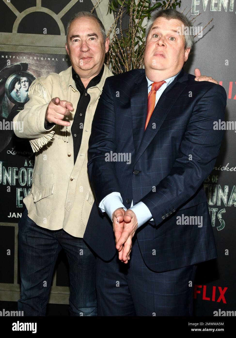 Barry Sonnenfeld, left, and Daniel Handler, right, attend the world ...