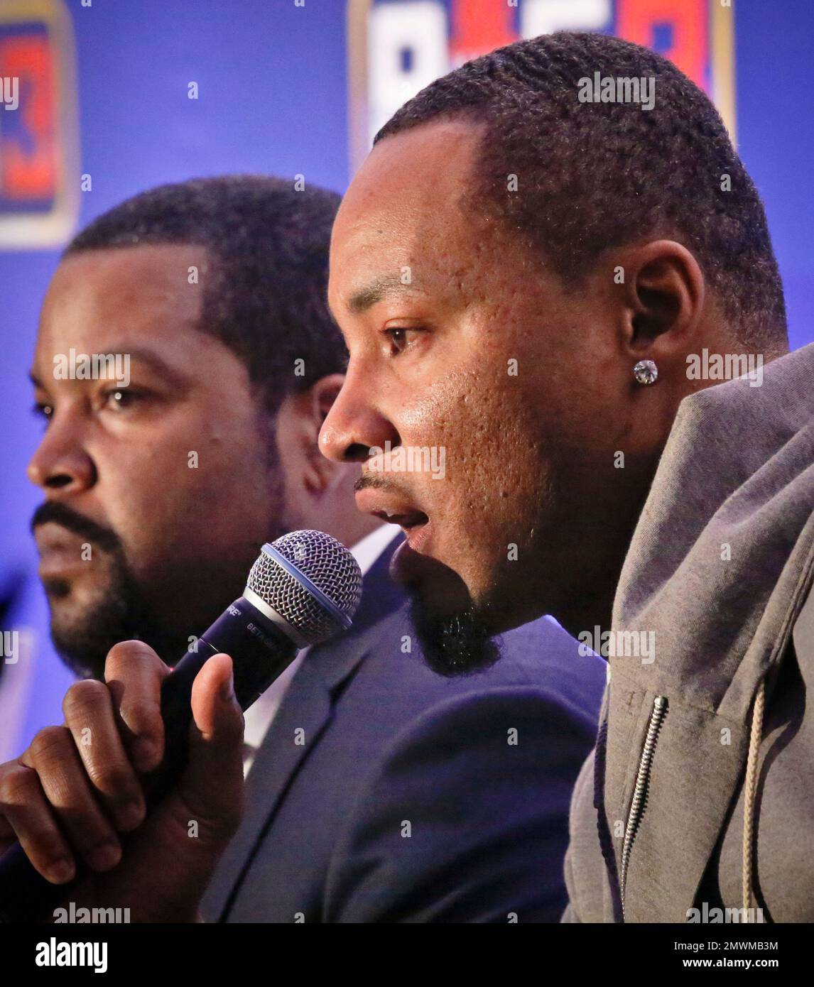 Former NBA player Rashard Lewis speaks after entertainer Ice Cube, left ...