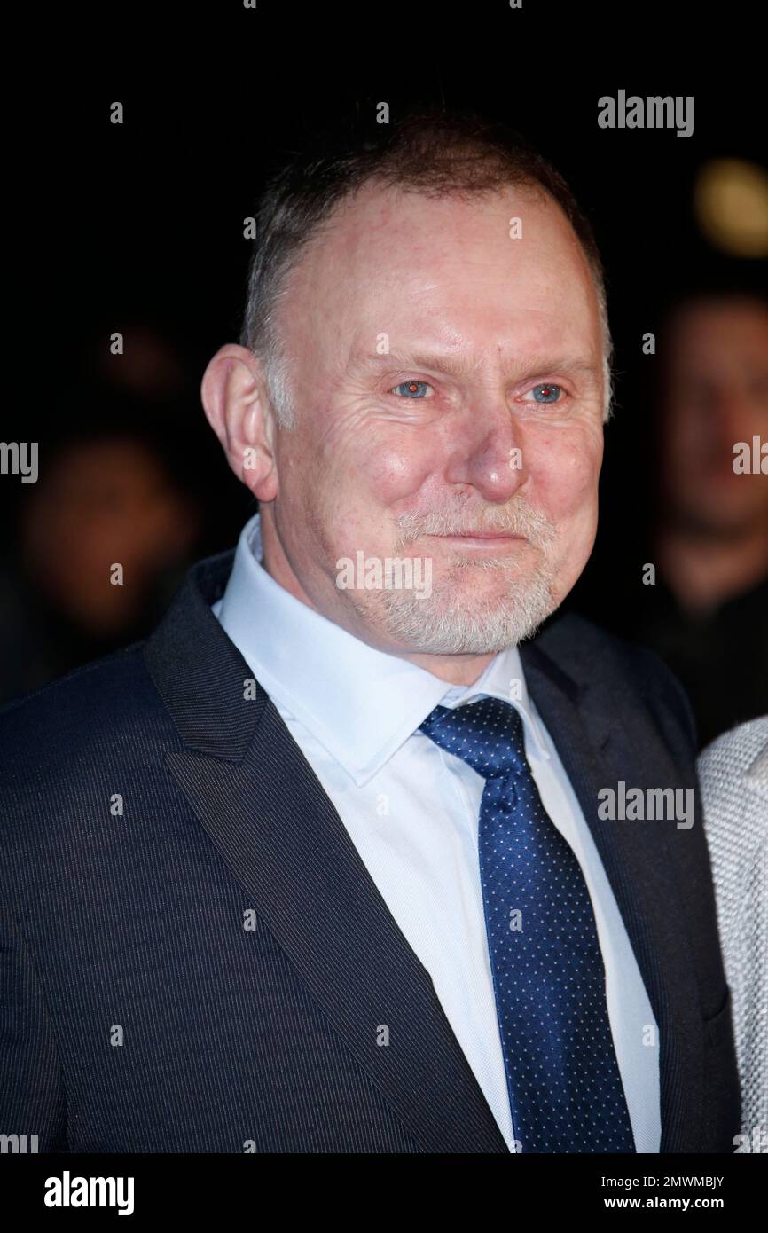 Actor Robert Glenister poses for photographers upon arrival at the ...