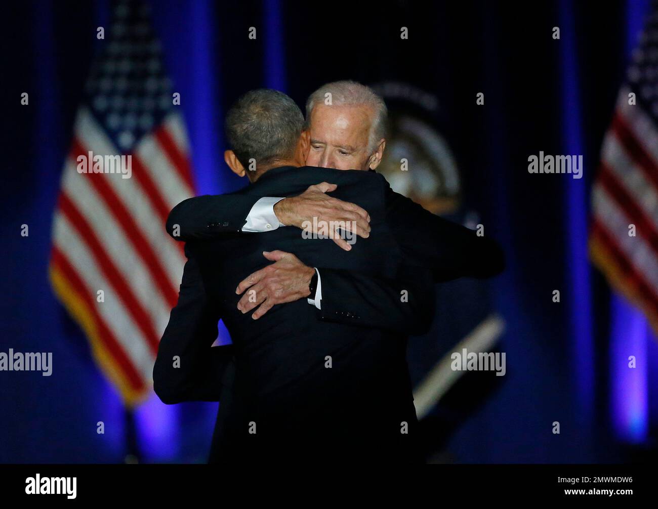 President Barack Obama hugs Vice President Joe Biden after giving his ...