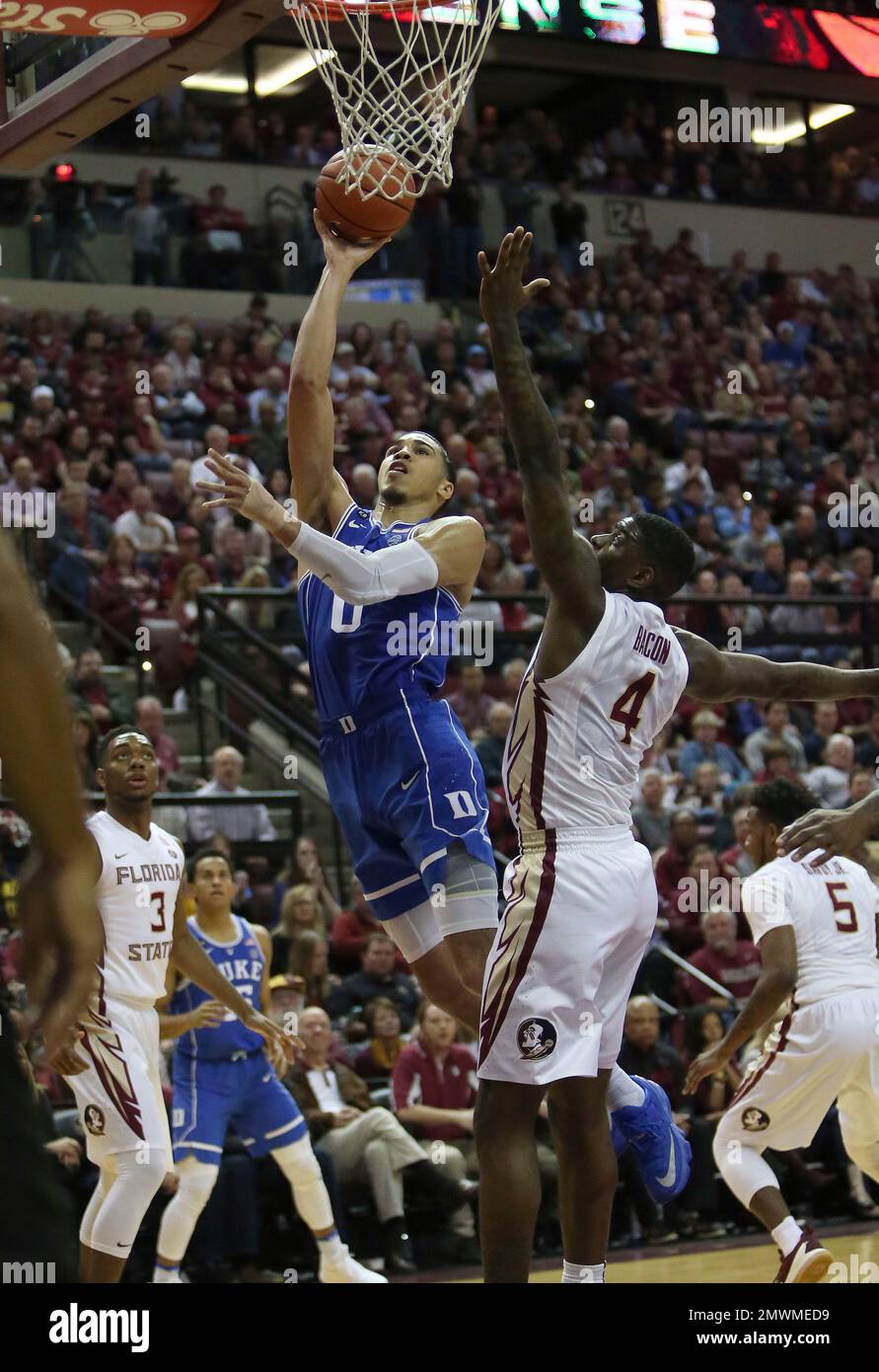 Duke's Jayson Tatum attempts a shot against the defense of Florida ...