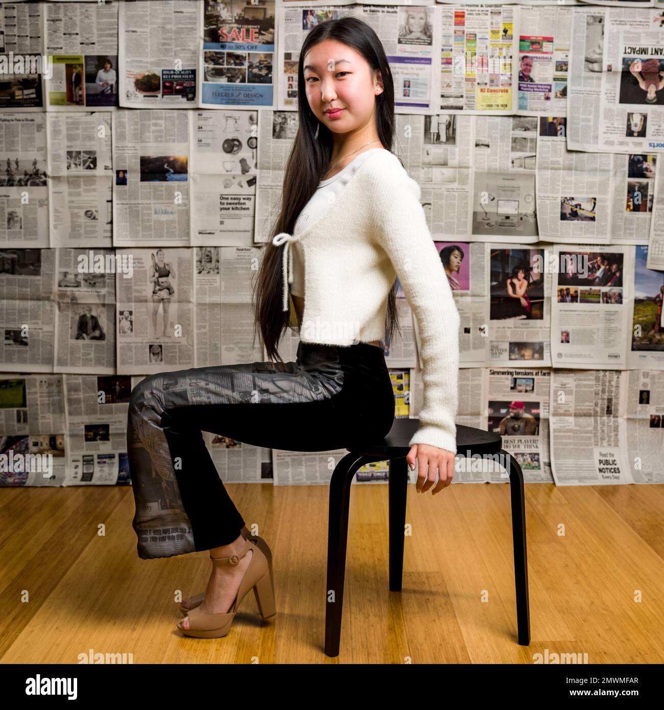 Full Body Tall Teenage Asian Girl Seated in Front of Backdrop of ...