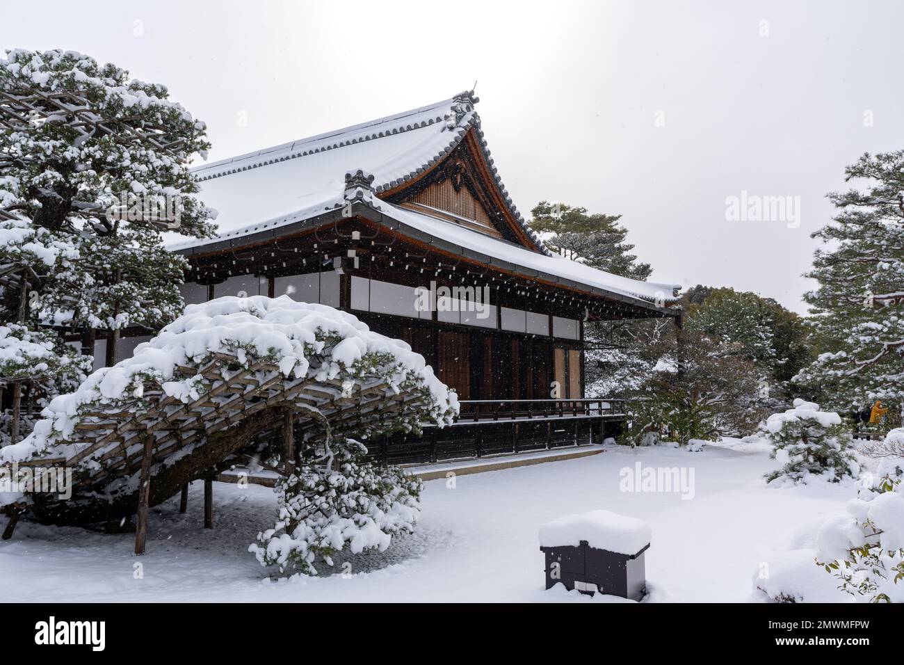 Snowy traditional Japanese building in Kinkaku-ji garden. Kyoto, Japan ...
