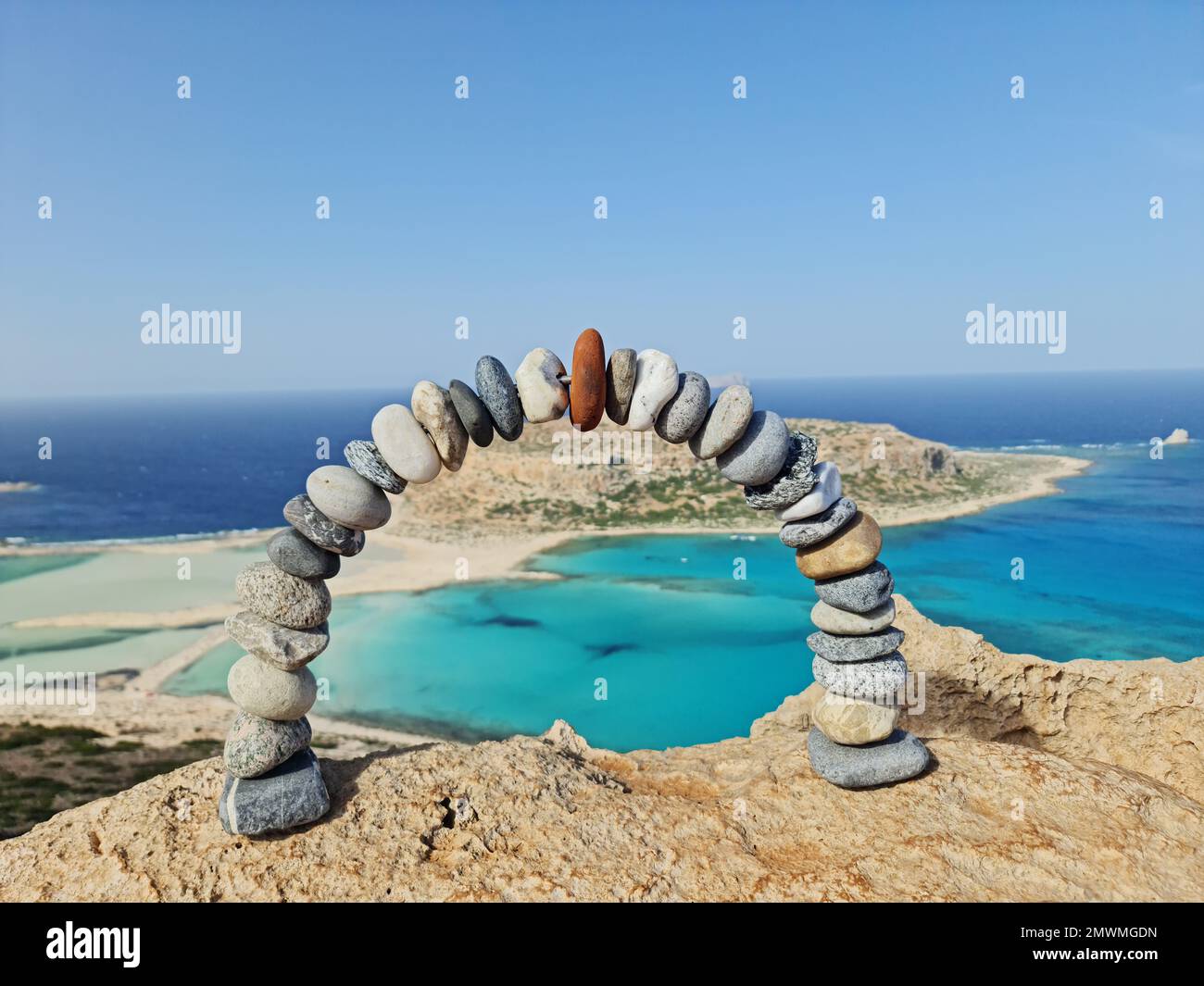 An arch made of small stones(Rock stacking) at the famous Balos beach ...