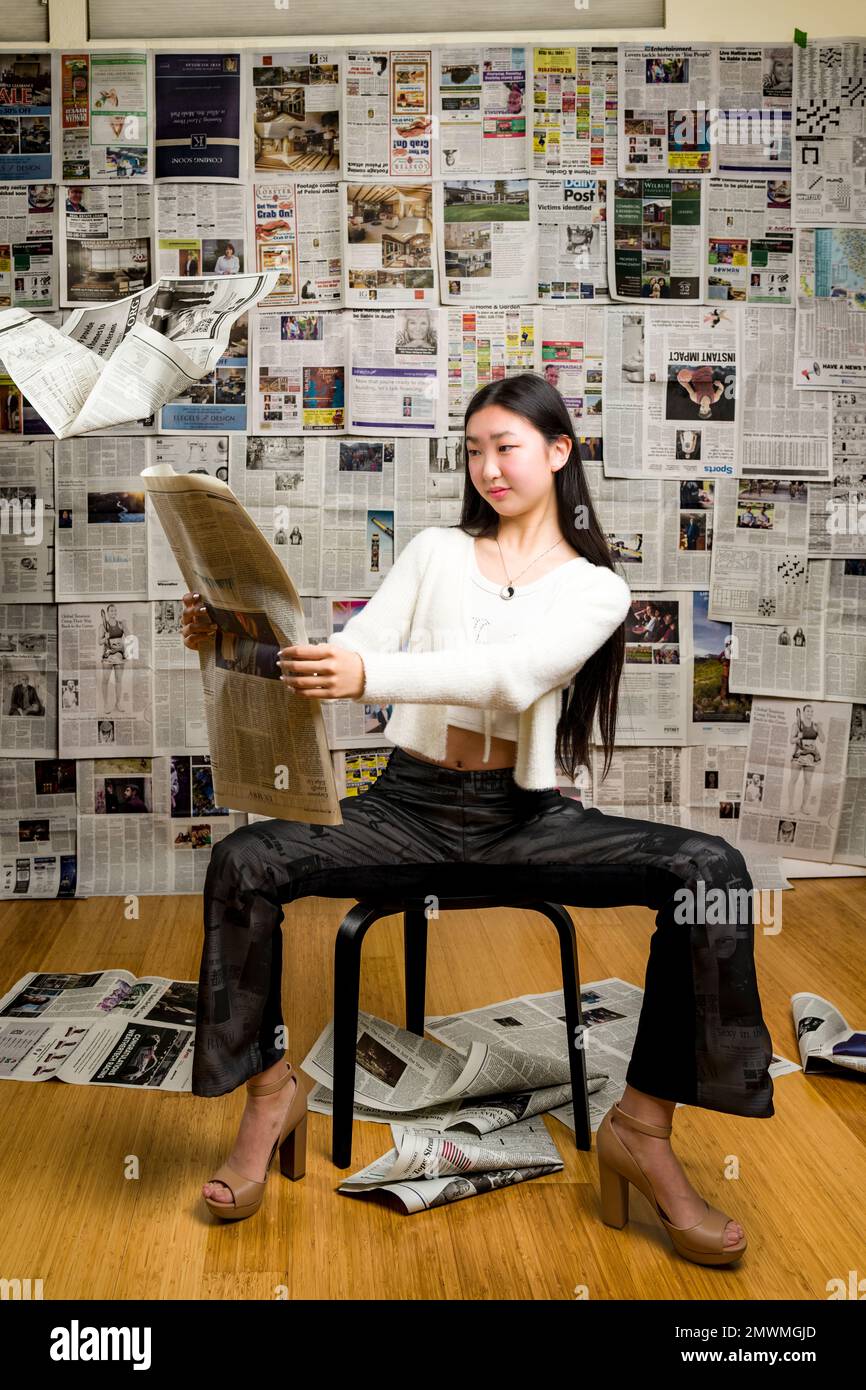 Full Body Tall Teenage Asian Girl Seated in Front of Backdrop of ...