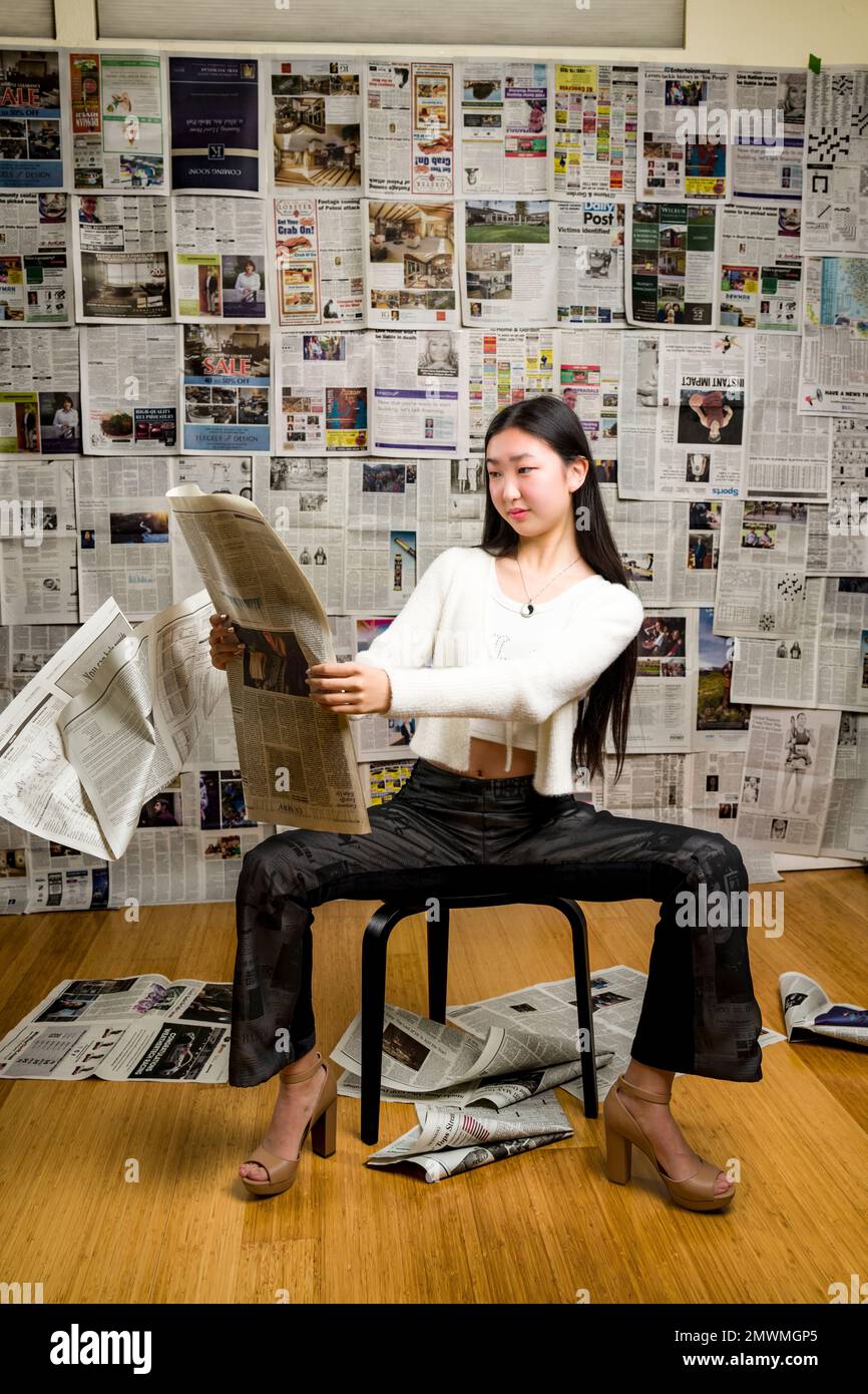 Full Body Tall Teenage Asian Girl Seated in Front of Backdrop of ...