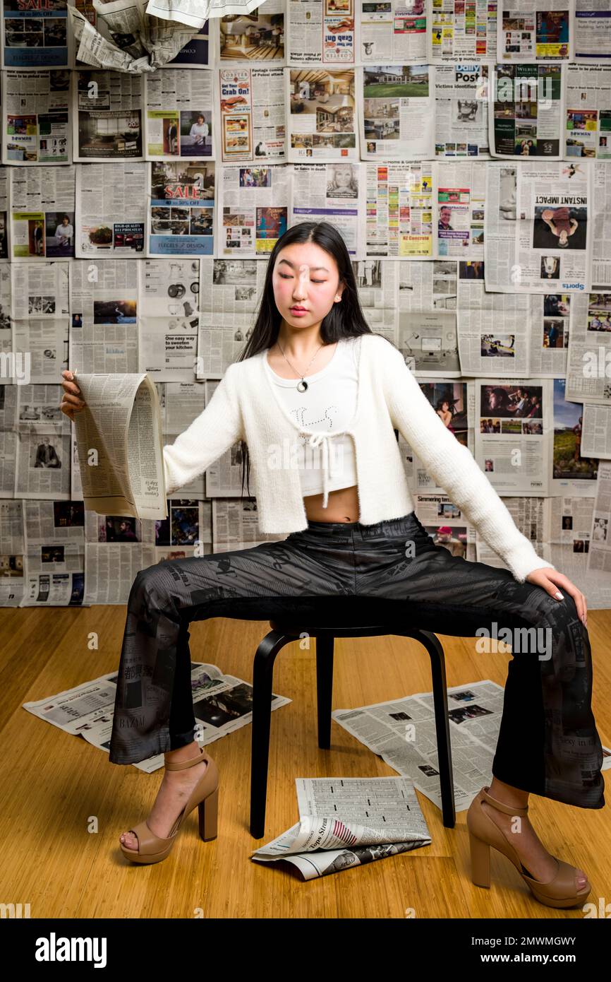 Full Body Tall Teenage Asian Girl Seated in Front of Backdrop of ...
