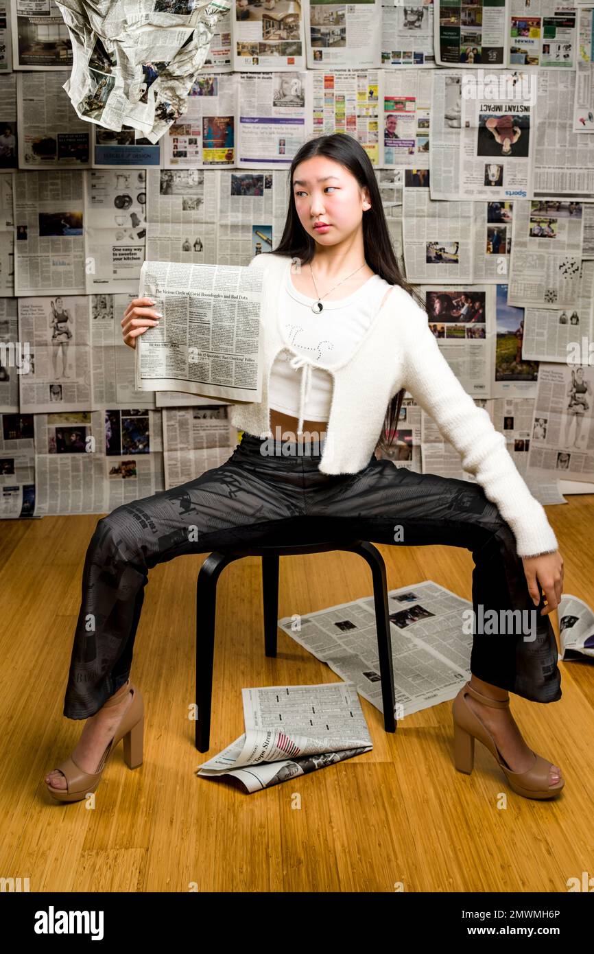 Full Body Tall Teenage Asian Girl Seated in Front of Backdrop of ...