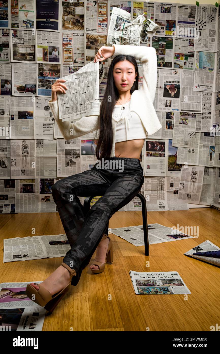 Full Body Tall Teenage Asian Girl Seated in Front of Backdrop of ...