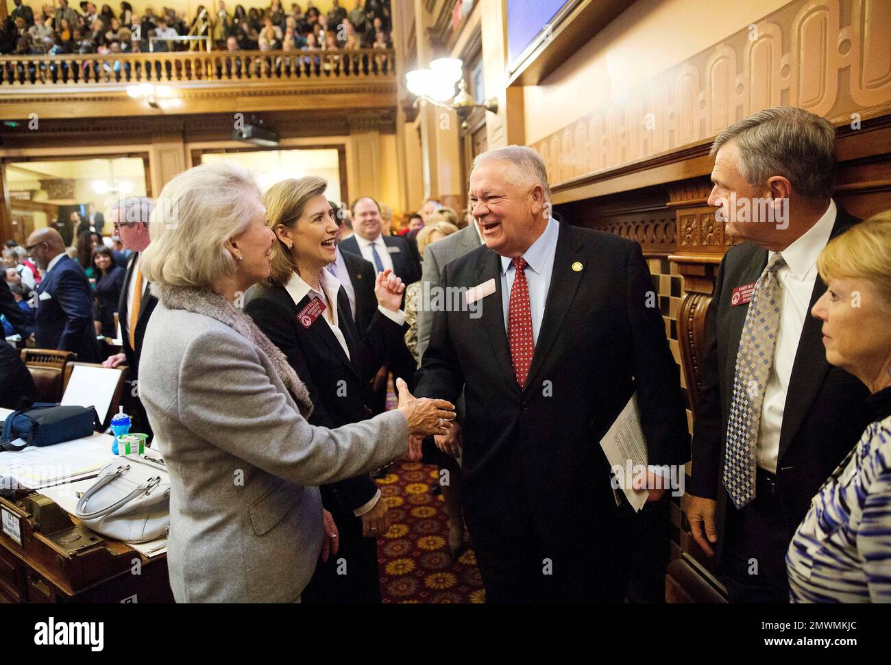 Georgia House Speaker David Ralston, center, is greeted on the House ...