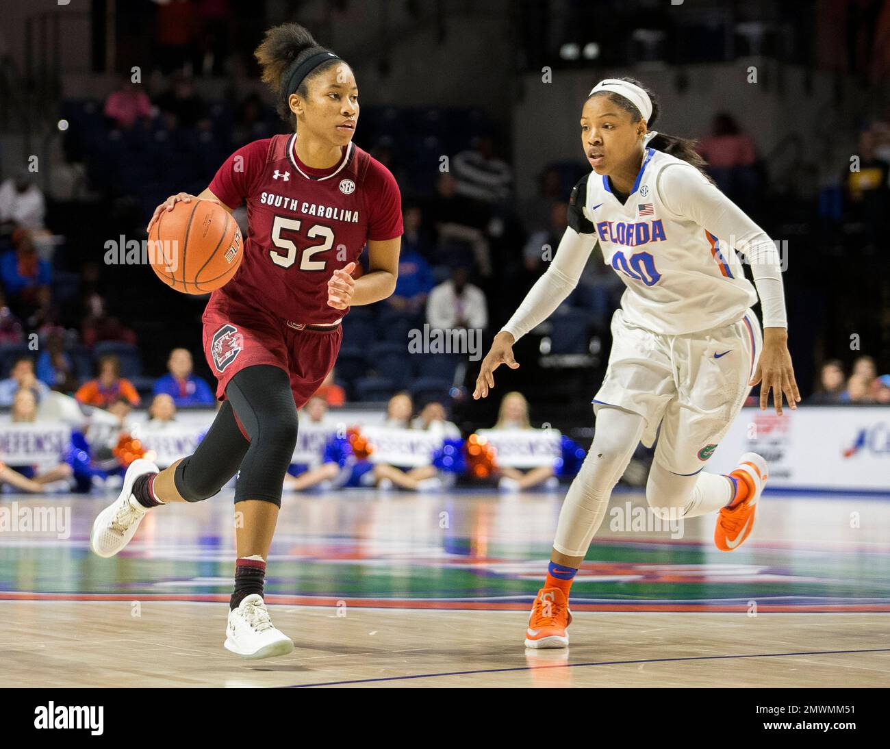 South Carolina guard Tyasha Harris (52) dribbles past Florida guard ...
