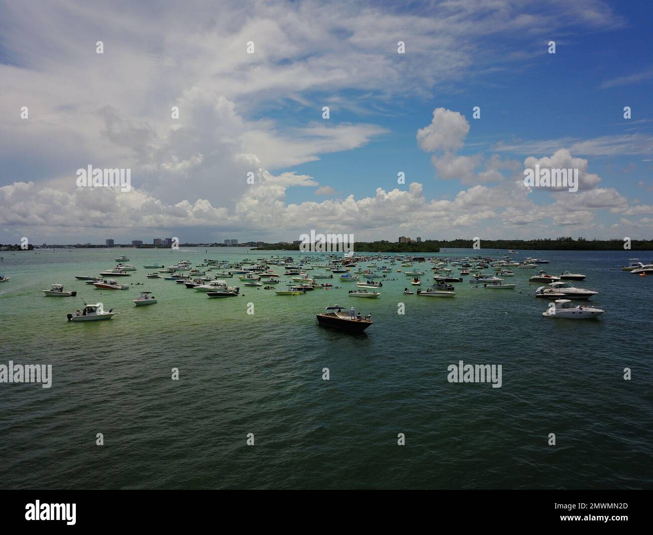 A beautiful shot of many boats and yachts in the sea under a cloudy sky ...