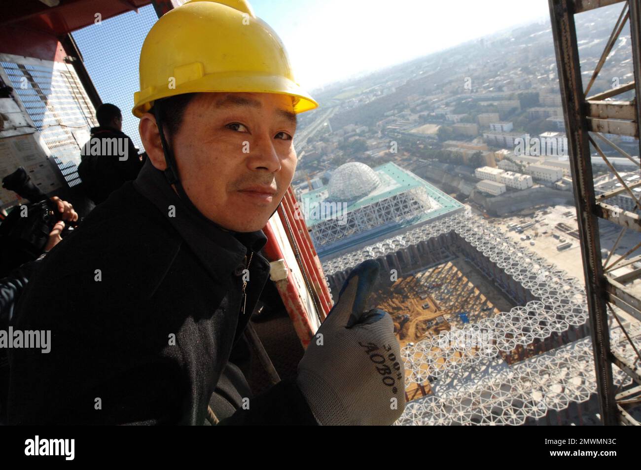 A worker is at the Grand Mosque of Algiers is under construction in the ...