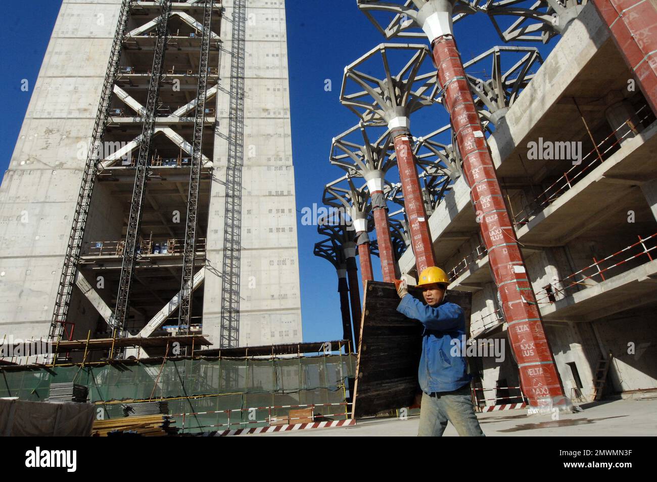 A worker is at the Grand Mosque of Algiers is under construction in the ...