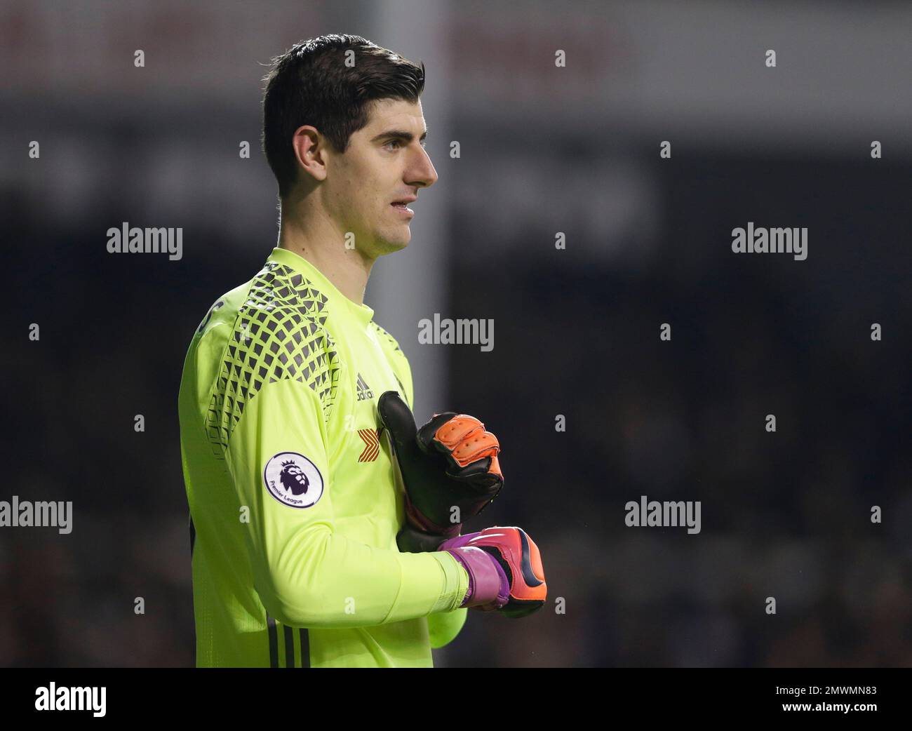 Chelsea goalkeeper Thibaut Courtois pulls on his gloves during the ...