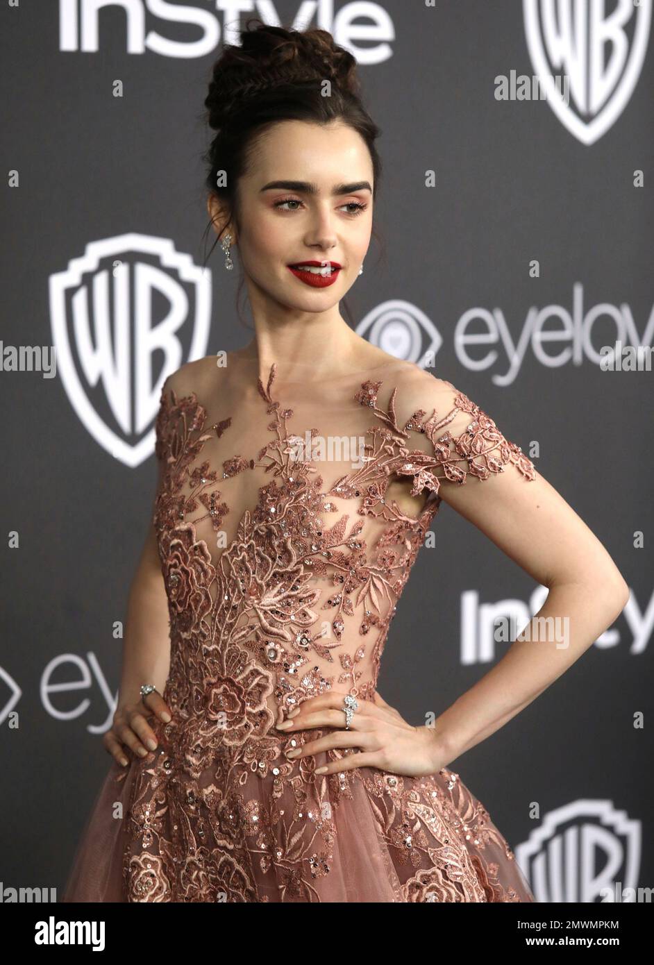 Lily Collins arrives at the InStyle and Warner Bros. Golden Globes ...