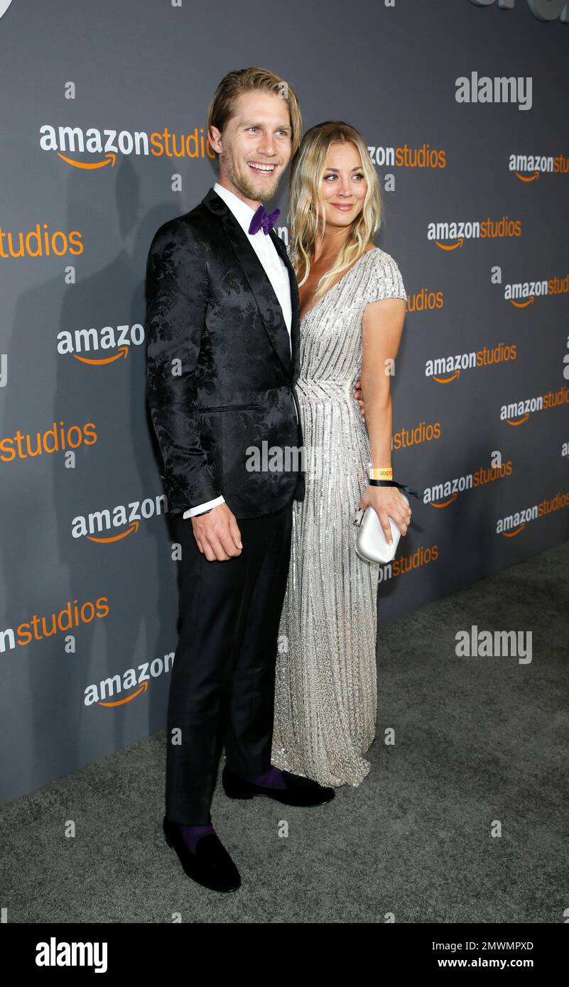 Karl Cook, left, and Kaley Cuoco arrive at the Amazon Studios Golden ...