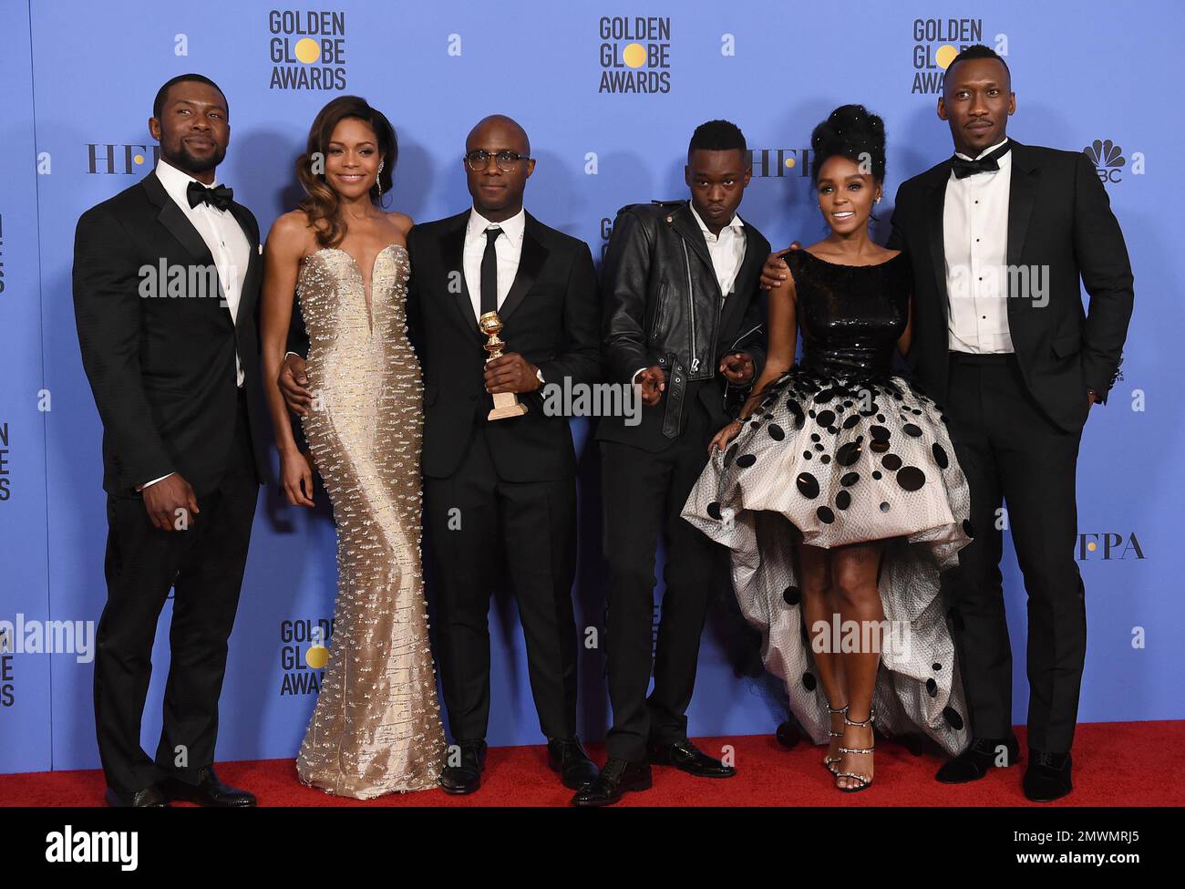 The cast and crew of "Moonlight" poses in press room with the award for ...
