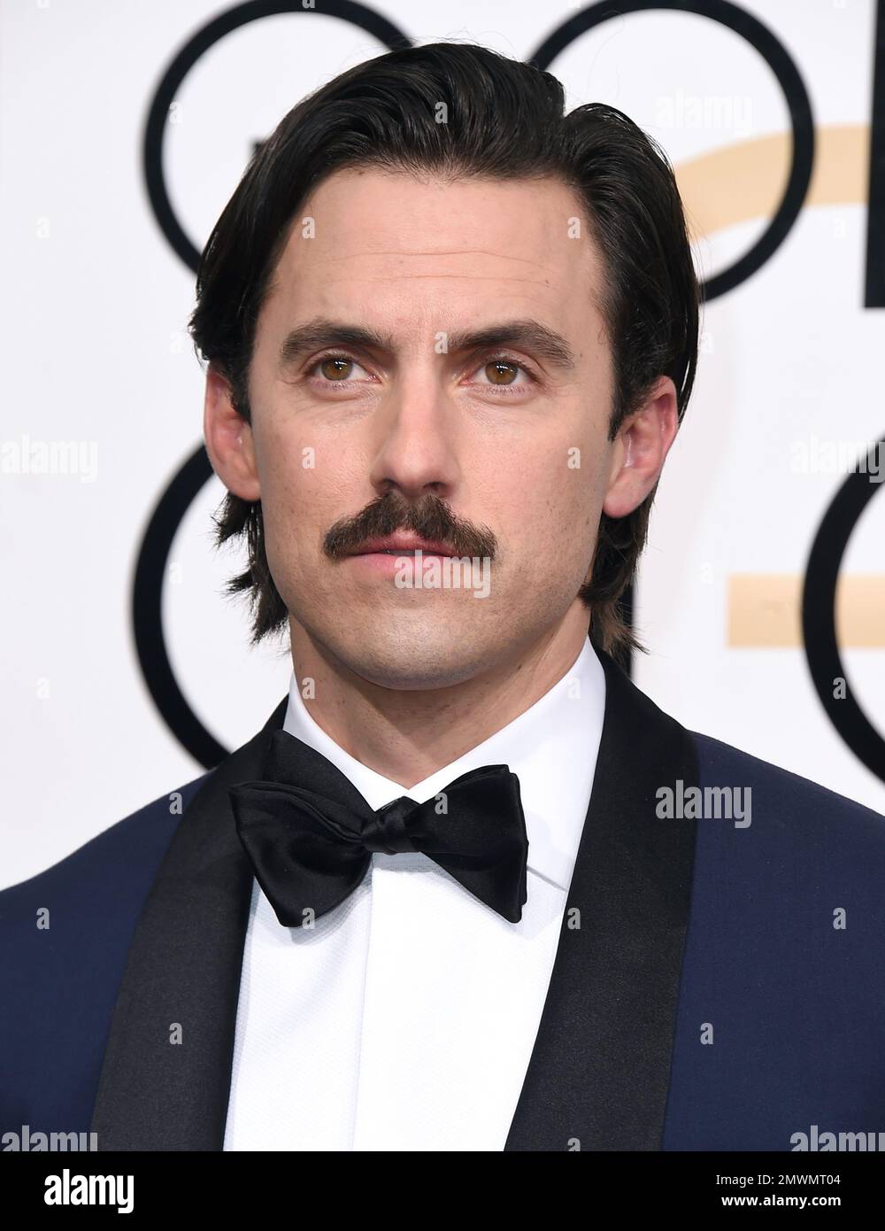Milo Ventimiglia arrives at the 74th annual Golden Globe Awards at the ...